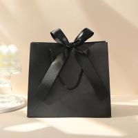 China Luxury Solid Color Kraft Paper Gift Bags with Ribbon Handles Custom Size Bulk for Retail Packaging for sale
