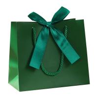 China Luxury Solid Color Kraft Paper Gift Bags with Ribbon Handles Custom Size Bulk for Retail Packaging for sale