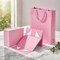 China Luxury Cardboard Gift Box Shopping Bag Set with Silver Rope Handles Custom Size for sale