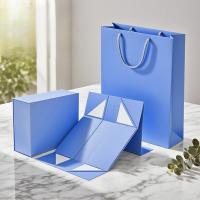 China Luxury Cardboard Gift Box Shopping Bag Set with Silver Rope Handles Custom Size for sale