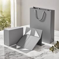 China Luxury Cardboard Gift Box Shopping Bag Set with Silver Rope Handles Custom Size for sale