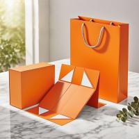 China Luxury Cardboard Gift Box Shopping Bag Set with Silver Rope Handles Custom Size for sale