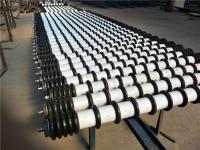 China Carbon Steel 63.5mm Spiral Return Roller with Deep Groove Ball Bearing for Belt Conveyor for sale