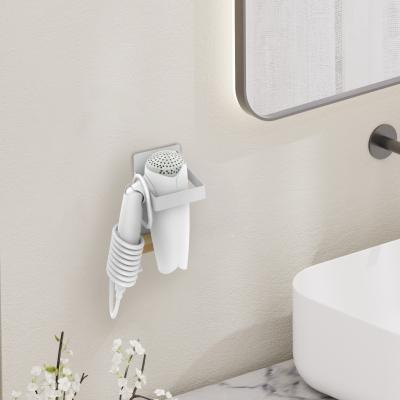 China Wall Mounted Household Magnetic Attraction Shower Rack for Bathroom Hair Dryer Holder for sale