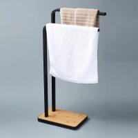China New Black Bath Towel Stand Tower Holder With Two Arms Hand Free Standing Bathroom Wooden Bamboo Towel Rack for sale