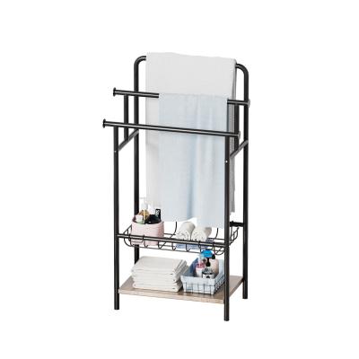 China Free Standing Towel Rack Multifunctional Household Bathroom Towel Organizer Bathroom Blanket Rack With Storage Basket for sale