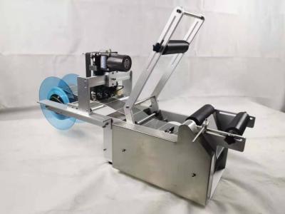 China Semi Automatic Manual Round Bottle Labeling Machine Sticker Small Tabletop for sale