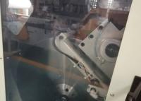China Large Rotary Non Woven Fabric Cutting Cotton Tissue Machine Rotary Cutter Machine for sale