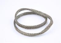 China SS316L Compressed Knitted Wire 28mm Round Flat Tube Over Rubber Core Rod for sale