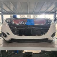 China Vezel Front Bumper Assembly High-quality Universal Fitment Park Assist Sensor Cutouts Left Right Brake Lights Turn Signals for sale