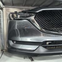 China For Mazda CX5 2017-2021 Auto Body Parts Front Bumper Kit with Grill Easy Installation Durable Plastic Includes Fog Light for sale
