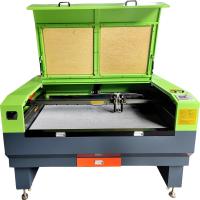 China Non-Burning CO2 Laser Cutting Machine 1500W Water-Cooled Seamless Apparel Fabric Leather Cutter Polo Shirt Collars Plackets for sale