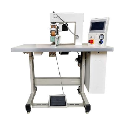 China New Auto Garment Equipment Adhesive Tape Folding Machine with PLC Core Seamless Connection Sewing Machines for sale