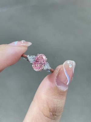 China 1.69ct Lab Grown CVD Pink Diamond Oval Three Stone Ring VVS2 IGI Certified for sale