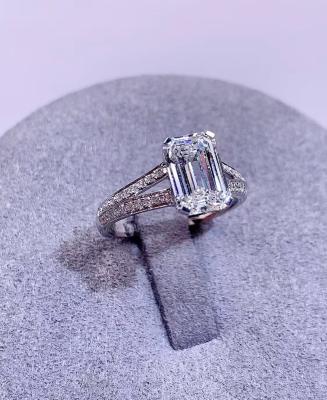 China Emerald Cut 2.1ct Lab Created White Diamond Solitaire Ring 18k Gold Pave Band for sale