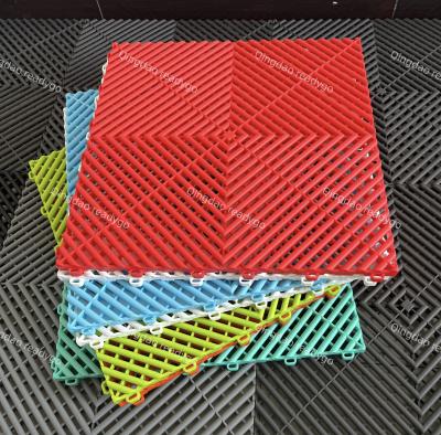 China Heavy Duty Polypropylene Ribbed Garage Floor Tiles 400×400×18mm with 2500 lbs Load Capacity for sale