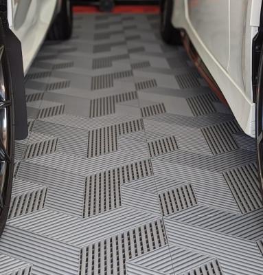 China 18mm Anti-Impact Garage Floor Tiles with Interlocking Puzzle Design and Slip-Resistant Ribbed Surface for sale