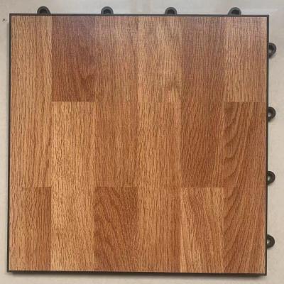 China Dark Wood Interlocking Portable Dance Floor Tile 300x300x12mm - Slip Resistant & UV Protected for Indoor/Outdoor Use for sale