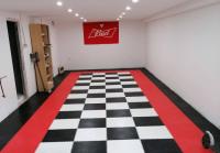 China 6.5mm PVC Interlocking Garage Floor Tiles 498x498mm - Anti-Fire Anti-Slip Industrial Flooring for sale
