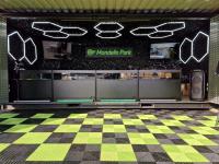China Interlockable Polypropylene Garage Floor Tiles 400×400×18mm with Rib Pattern Surface and Chemical Resistance for sale