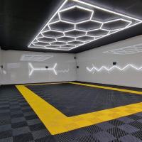 China Interlockable Polypropylene Garage Floor Tiles 400×400×18mm with Rib Pattern Surface and Chemical Resistance for sale