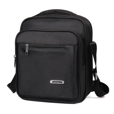 China Solid Mens Canvas Shoulder Bags Buckle Casual Portable Multi Pocket Crossbody Bag for sale