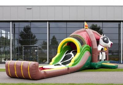 China Logo Printing Outdoor Inflatable Combo Farm Cow With Slide For Event for sale