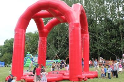 China Safe 4 Person Adult Inflatable Games Red Inflatable Bungee Jumping for sale