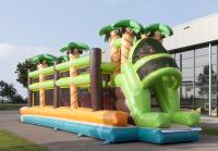 China Comercial Jungle Theme Mega Bouncy Blow Up Obstacle Course Red Balls for sale