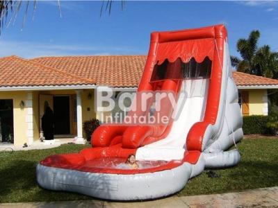 China Red And White Big Kid Blow Up Inflatable Water Slides Flame Retardant for sale