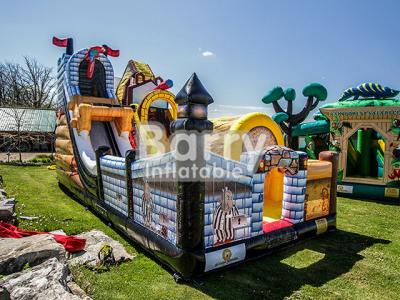 China Commercial Kingdom Pirates Slide Inflatable Blow Up Obstacle Course With Bouncer for sale
