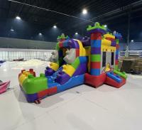 China Tarpaulin Commercial Bounce Houses With Slides Amusement Bouncy Castle Combo for sale