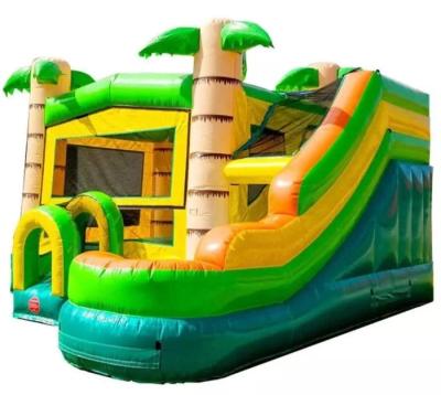 China Home Use Inflatable Jungle Bounce House With Slide Palm Tree Inflatable Bouncer for sale