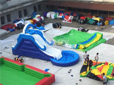 China Commercial Giant Pvc Tarpaulin Inflatable Water Slides With Pool Customized for sale