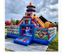 China Geometric Carnival Inflatable Bounce Castle with Dual Slides – Commercial-Grade Kids’ Play Center for sale
