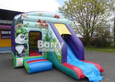 China Commercial Jungle Theme Giant Inflatable Combo Tropical Bouncer With Slide for sale