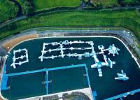 China 0.9mm PVC Tarpaulin Inflatable Floating Water Park Games For Hotel Pool for sale