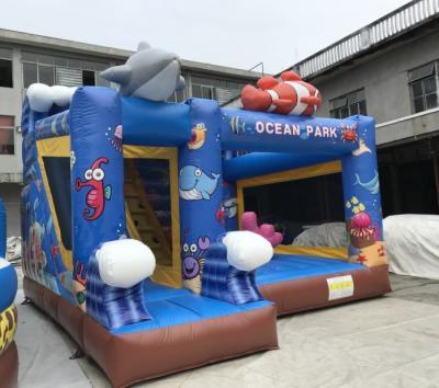 China 0.55mm PVC Inflatable Bouncer Ocean Themed Jumping Castle With Slide 7mLX5mWX4mH for sale