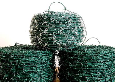 China 1.2mm 15kg Coil Weight Galvanized Razor Barbed Wire Green Iron for sale