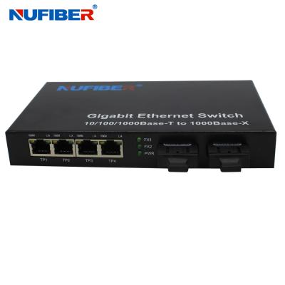 China 1000M 4-port Rj45+2 fiber port with SM Dual fiber SC 1310nm Optic Fiber Ethernet Switch for sale