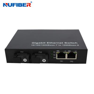 China 1000M 2-port Rj45+2 fiber port with SM single fiber SC 1310nm/1550nm Fiber Optic Ethernet Switch for sale