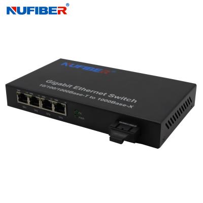 China 10/100/1000M 4-port Rj45+1 fiber port single  fiber port SM 1310nm 20km SC Fiber Optic Ethernet Switch media converter for sale