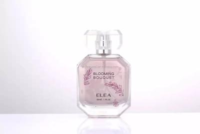 China Luxury Glass Empty Perfume Bottles Bulk Embossed Logo With Surlyn Cap for sale