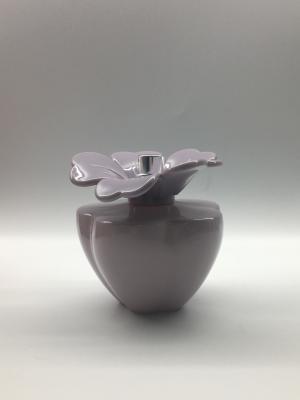 China Atomizer Sprayer Refillable Glass Bottle Flower Cap 100ml Perfume Bottle For Lady for sale
