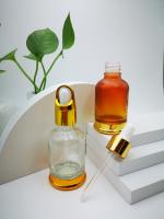 China Customizable 2023 new design 30ml glass dropper bottles with bottom bracket for essential oil and cosmetics for sale