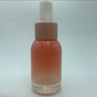 China 50ml Pink Lotion Glass Bottle Customized Logo OEM Glass Bottle Lotion Bottle Wholesale Manufacturer for sale
