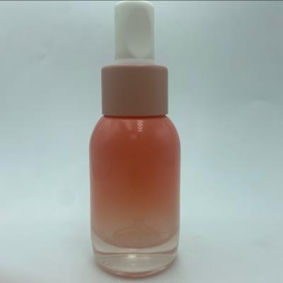 China 50ml Pink Lotion Glass Bottle Customized Logo OEM Glass Bottle Lotion Bottle Wholesale Manufacturer for sale