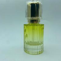China Yellow Premium Glass Lotion Bottle 40ml with Gold Pump Bottle Cosmetic Bottle OEM for sale