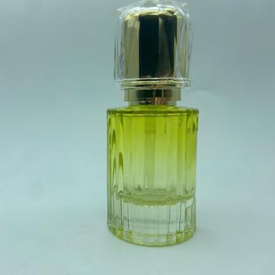China Yellow Premium Glass Lotion Bottle 40ml with Gold Pump Bottle Cosmetic Bottle OEM for sale