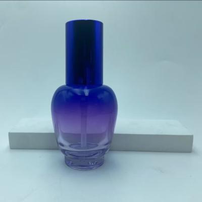 China Glass Lotion Bottle 30ml Blue Gradient Serum Bottle with Pump Oil Bottle Pump Bottle Cosmetic Bottle OEM for sale
